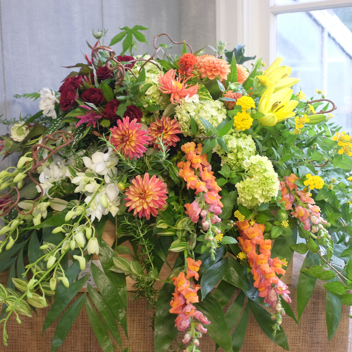 Sunset Casket Spray designed by Michler's Florist – Michler's Florist ...